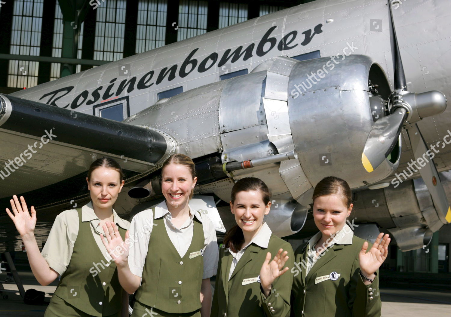 Four Waving Fair Hostesses Pose Pilot Editorial Stock Photo - Stock ...