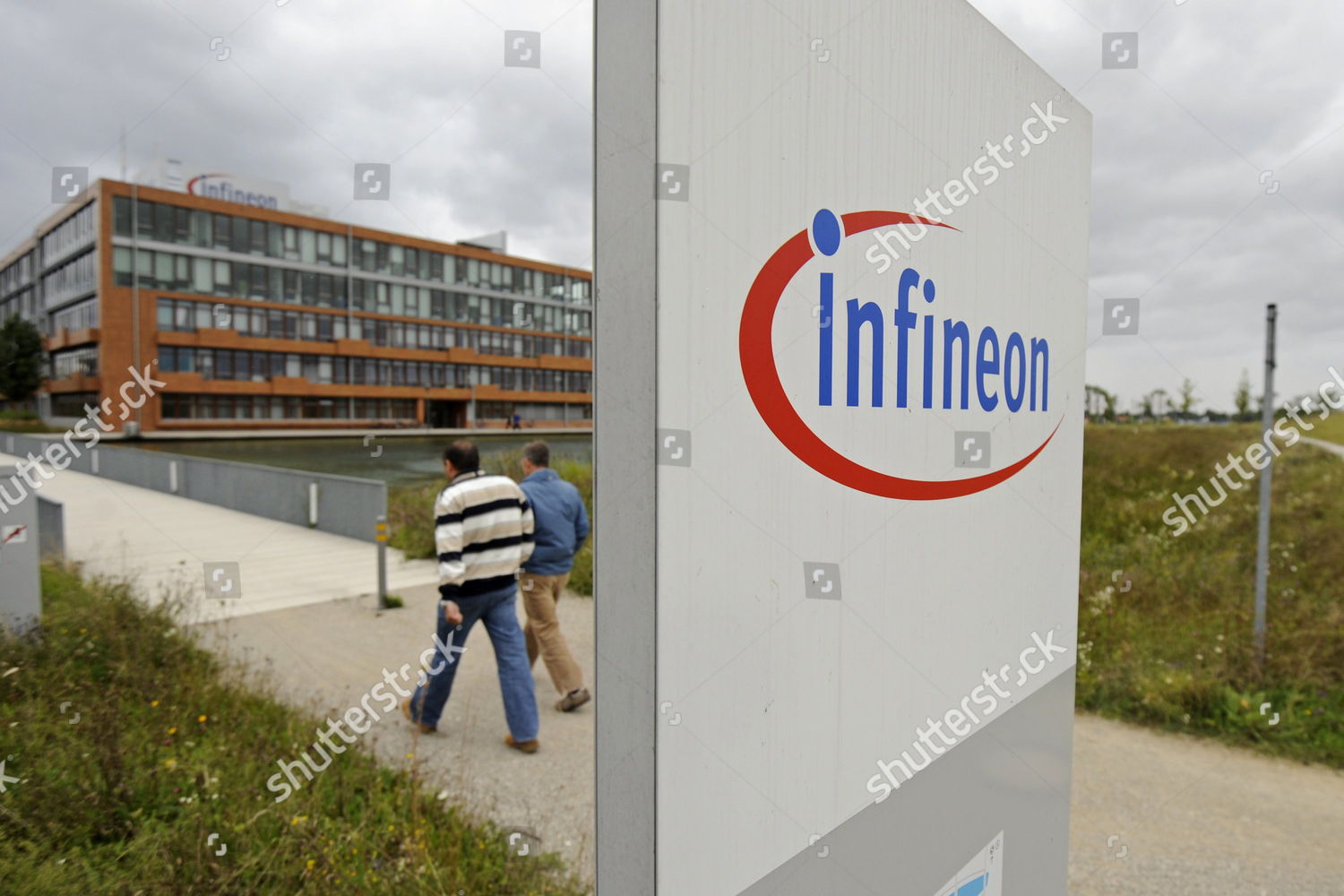 Infineon Employees Walk Past Company Logo Editorial Stock Photo - Stock ...