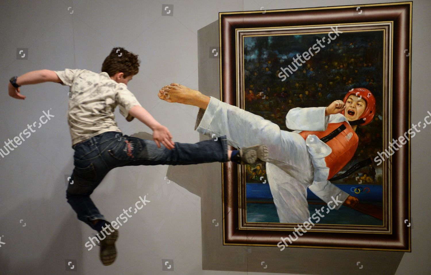 Boy Jump Kicks Towards 3d Artwork Editorial Stock Photo - Stock Image ...