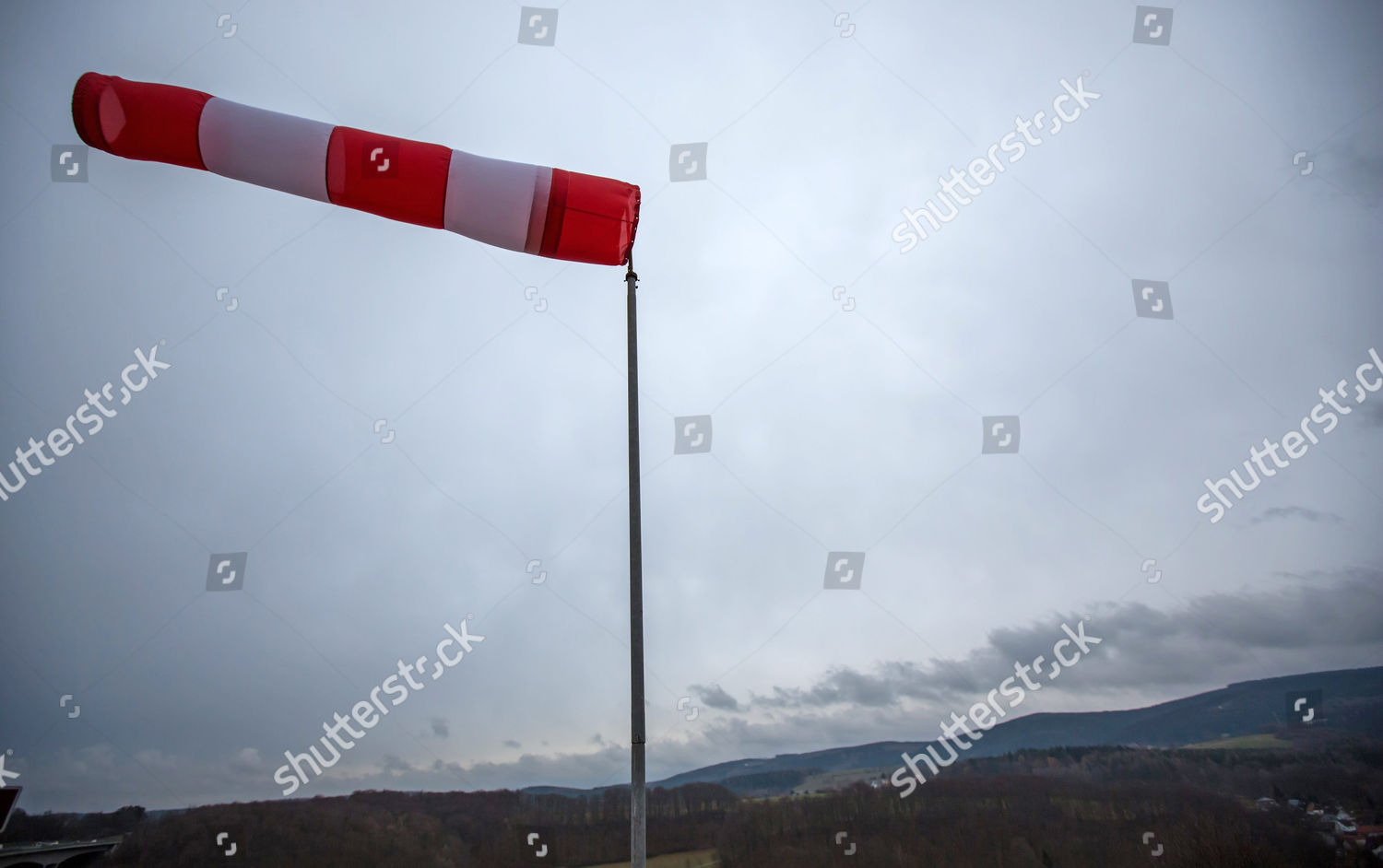 WINDSOCK INDICATES STRONG CROSS-WINDS GERABERG ÁGERMANY Editorial Stock ...