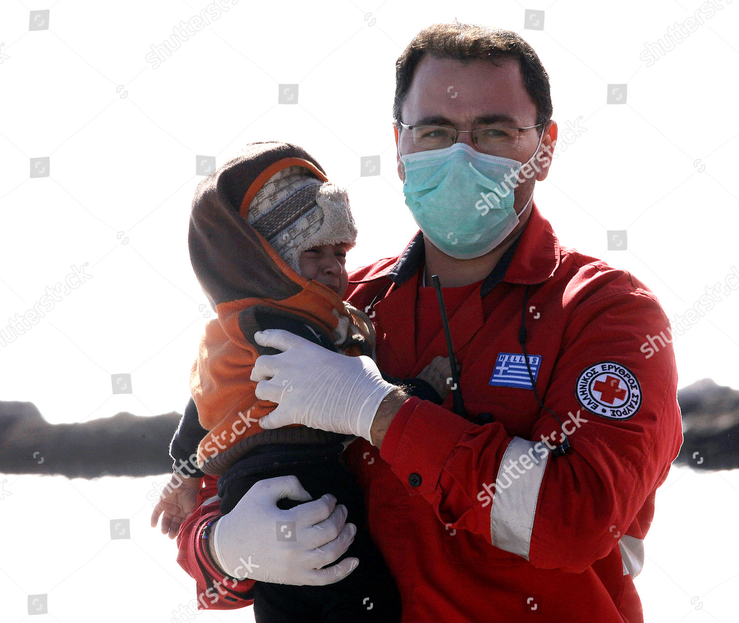 Greek Red Cross Worker Holds Crying Editorial Stock Photo - Stock Image ...