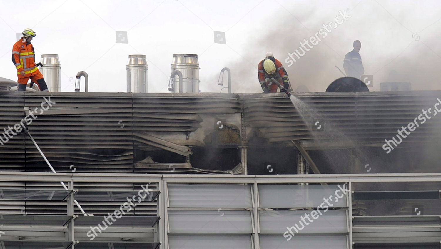 Firefighters Try Extinguish Fire On Roof Editorial Stock Photo - Stock ...