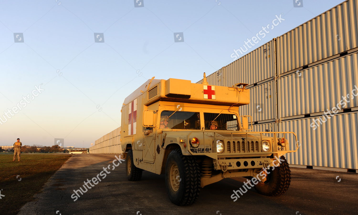 Military Ambulance Passes By Shipping Containers Editorial Stock Photo ...