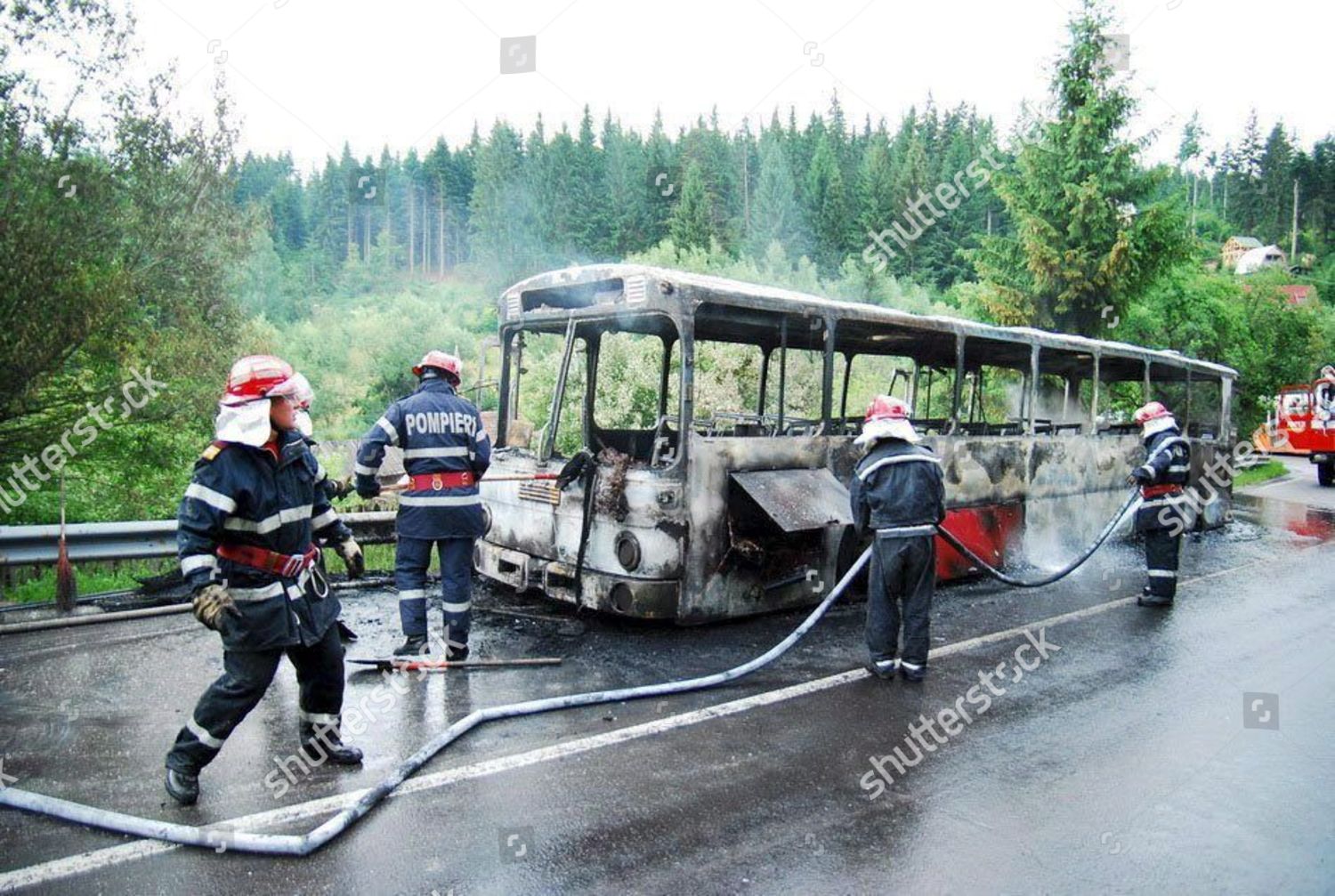 Firemen Work On Burnt Out Hungarian Editorial Stock Photo - Stock Image ...