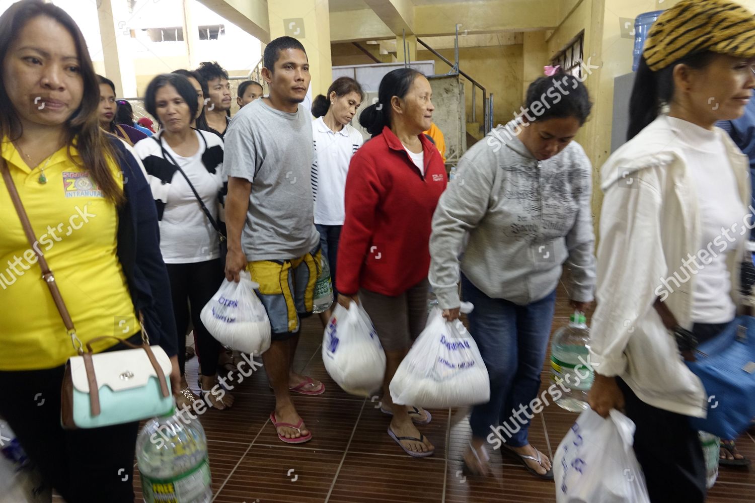 Filipino Villagers Receive Relief Goods During Editorial Stock Photo ...