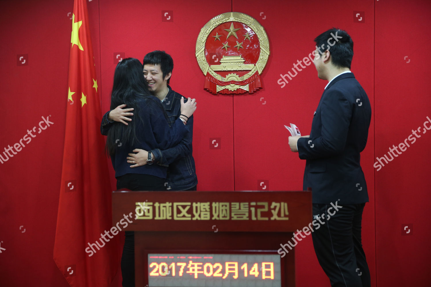Chinese Couple Hug Each Other During Editorial Stock Photo - Stock ...