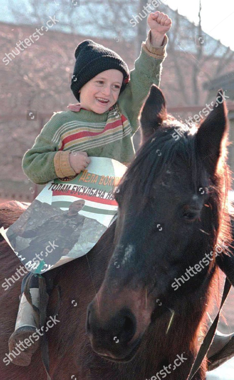 Chechen Boy On Horseback Raises His Editorial Stock Photo - Stock Image ...