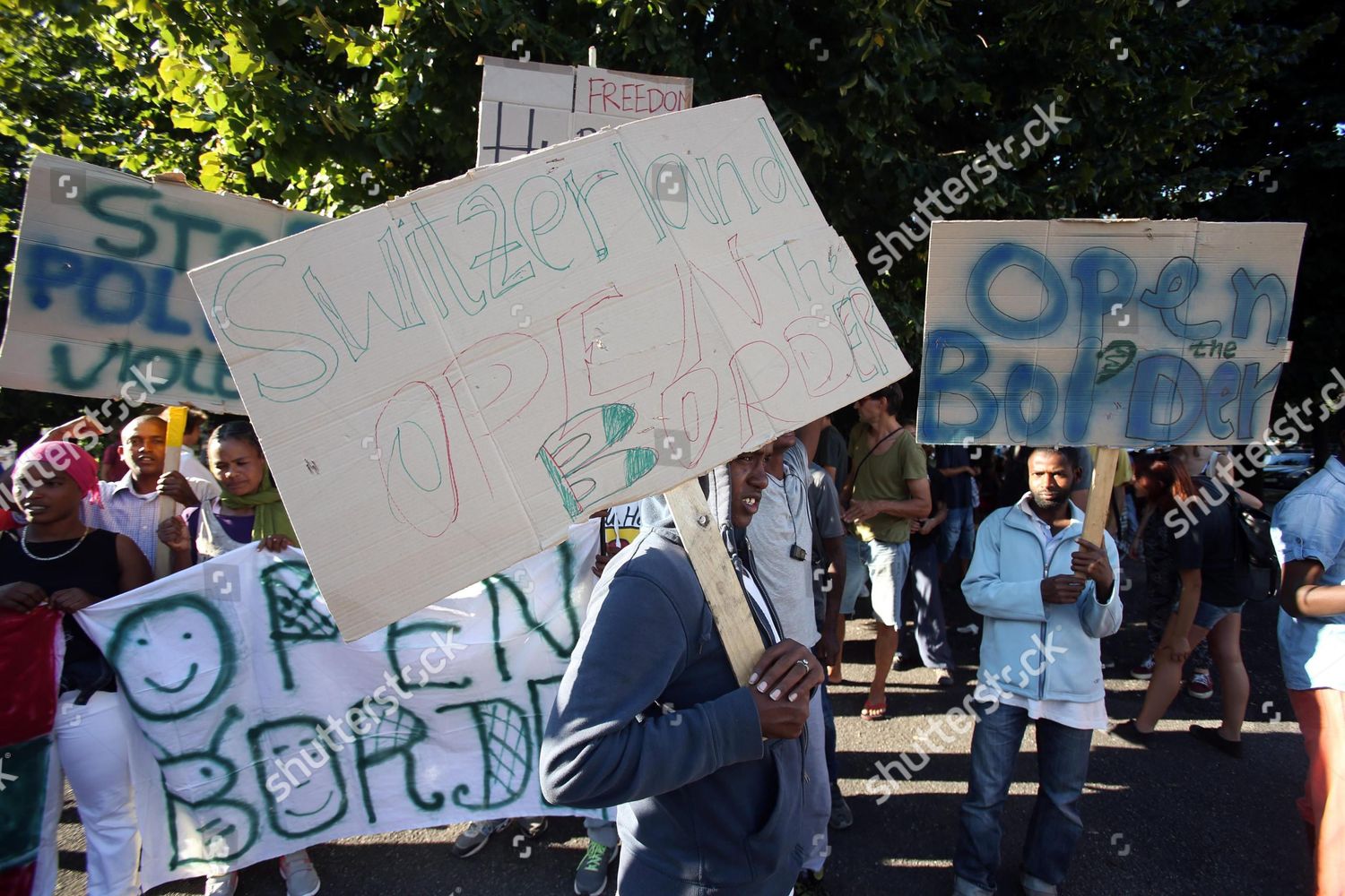 Migrant Hold Signs Demanding Switzerland Opens Editorial Stock Photo ...
