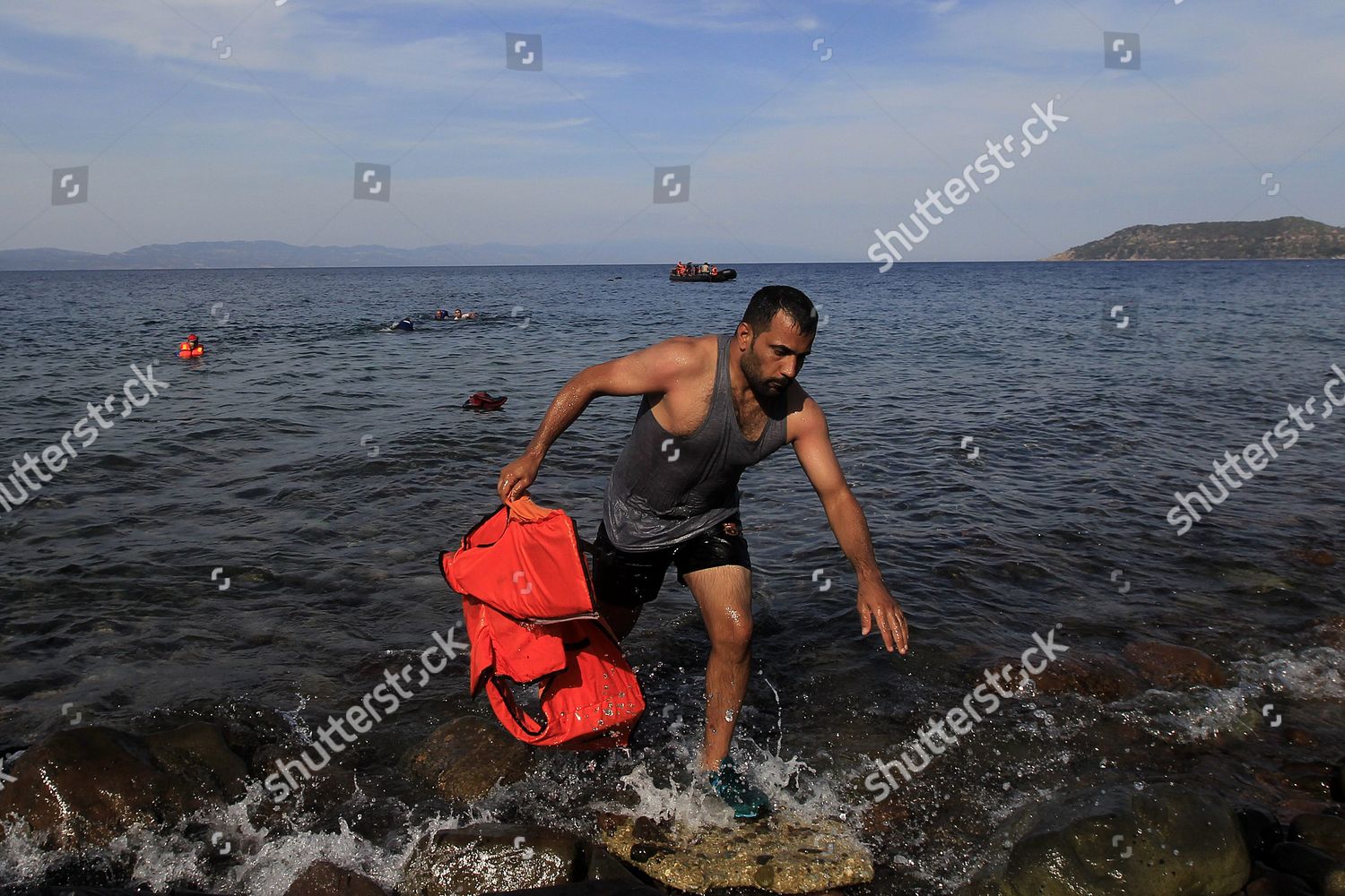 Migrant Man Reaches Shore Refugees Syria Editorial Stock Photo - Stock ...