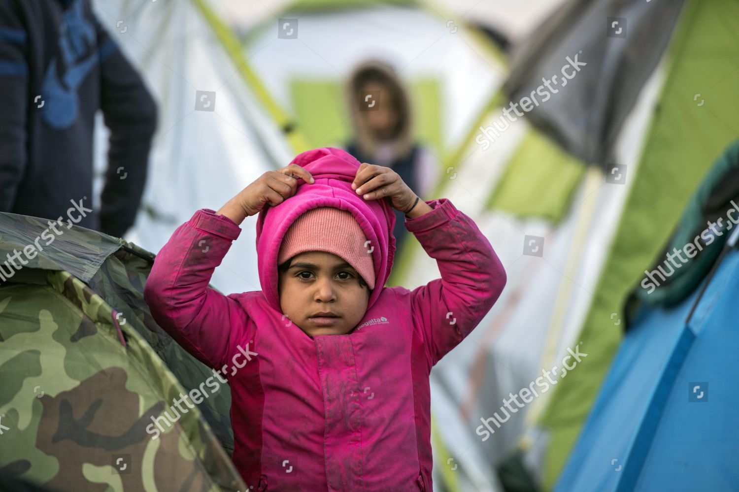 Refugee Boy Puts Cap On His Editorial Stock Photo - Stock Image ...