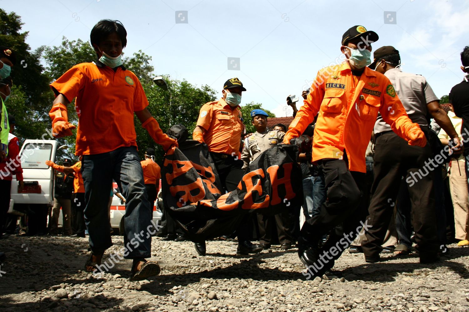 Indonesian Rescue Members Carry Dead Body Editorial Stock Photo - Stock ...