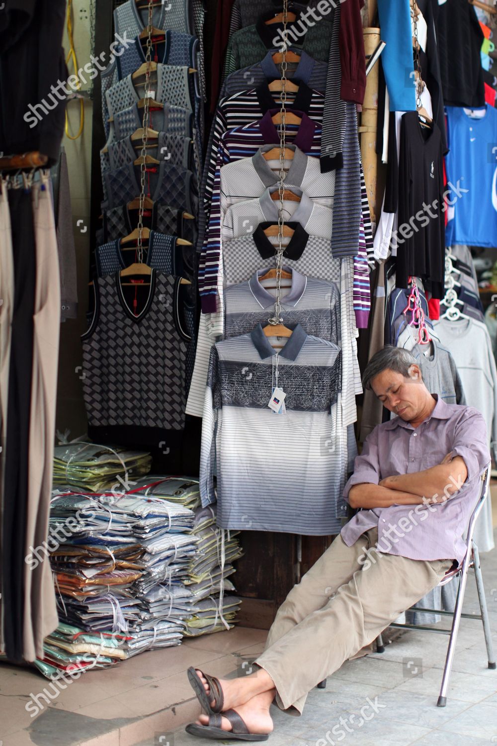 Man Selling Clothes Takes Nap Outside Editorial Stock Photo - Stock ...