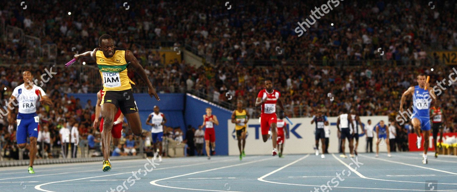 Usain Bolt Jamaica Crossing Finish Line Editorial Stock Photo - Stock ...