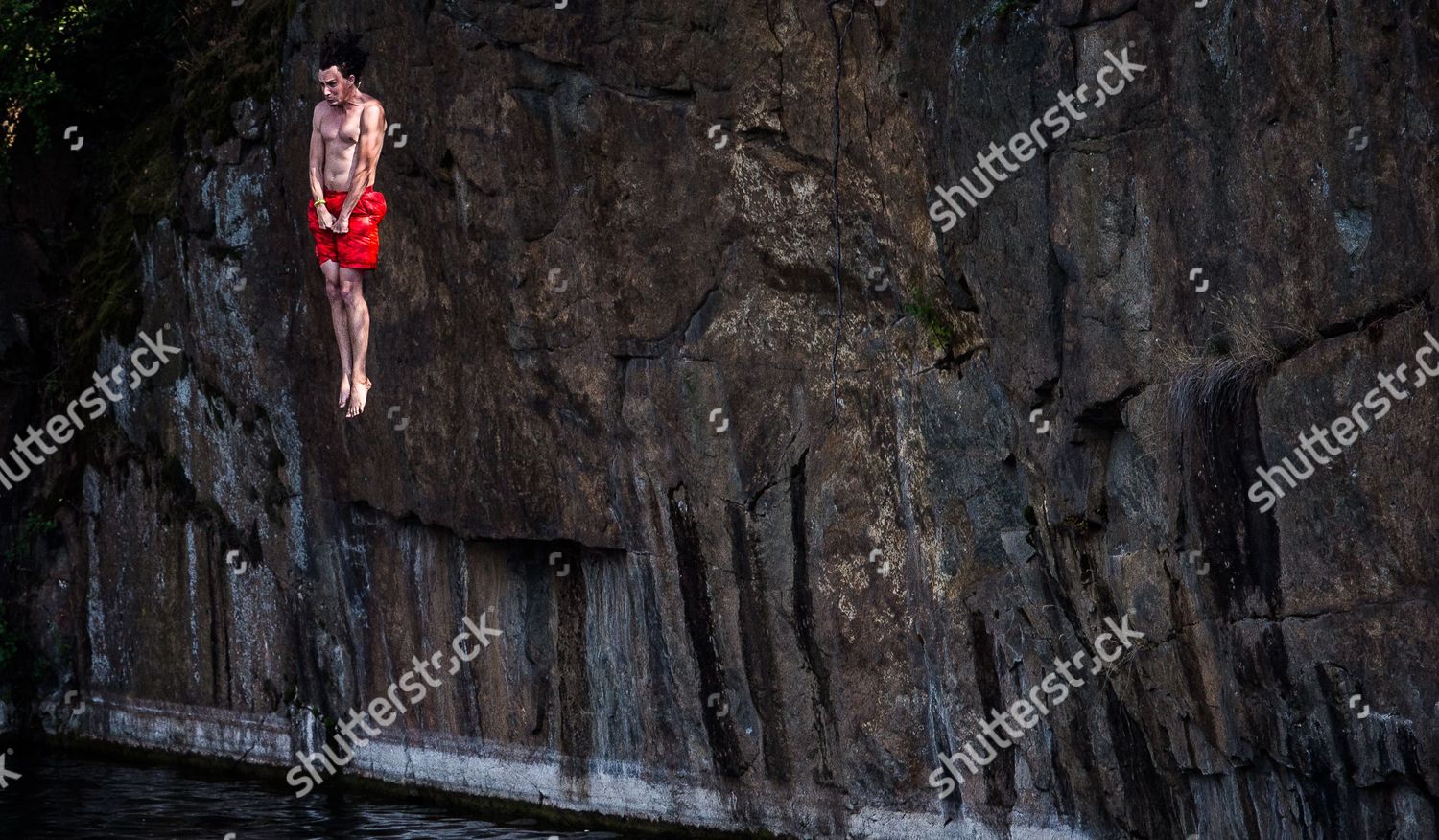 Man Dives Off 10 Meter Cliff Editorial Stock Photo - Stock Image ...