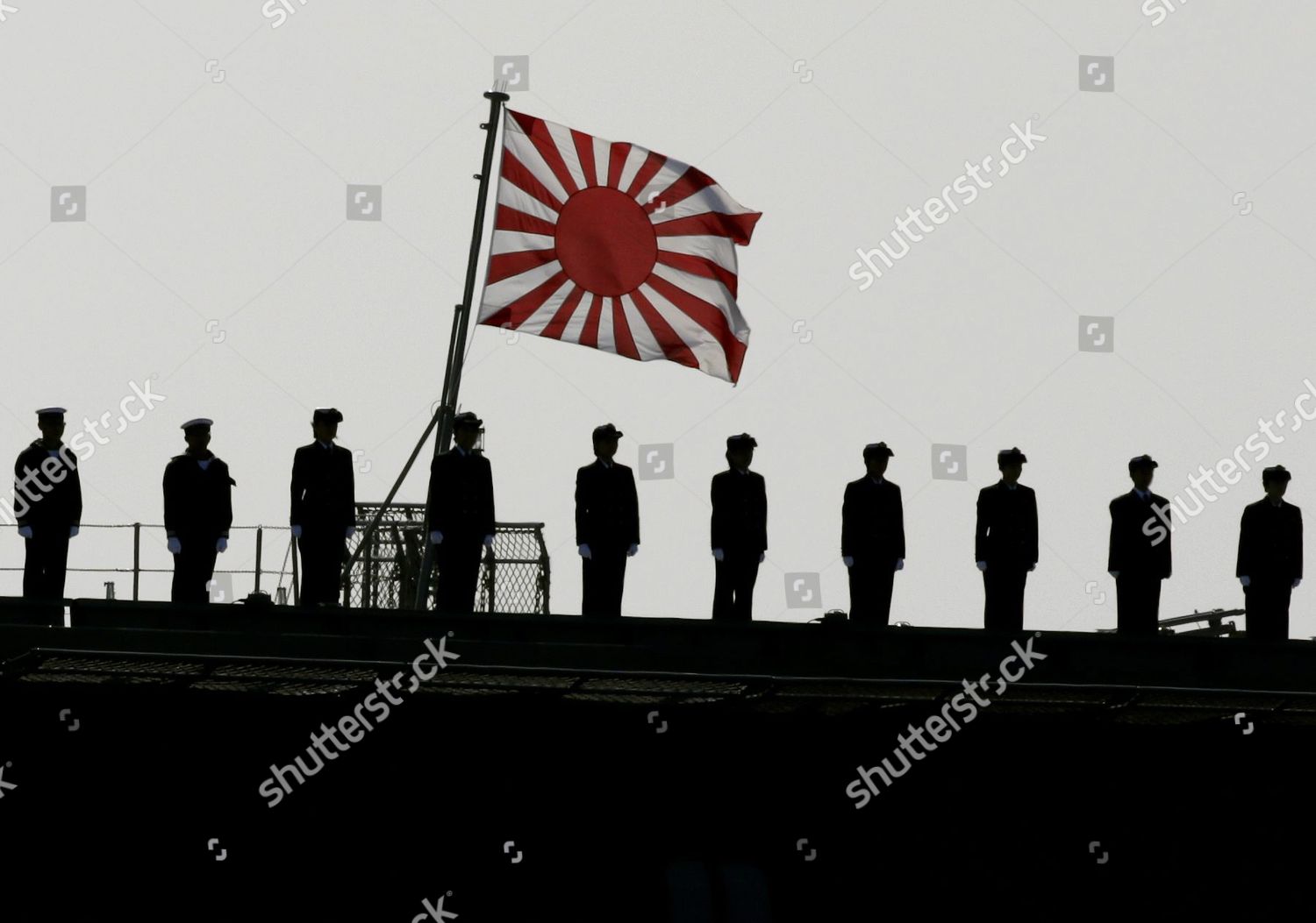 Rising Sun Flag Flies Over Military Editorial Stock Photo - Stock Image ...