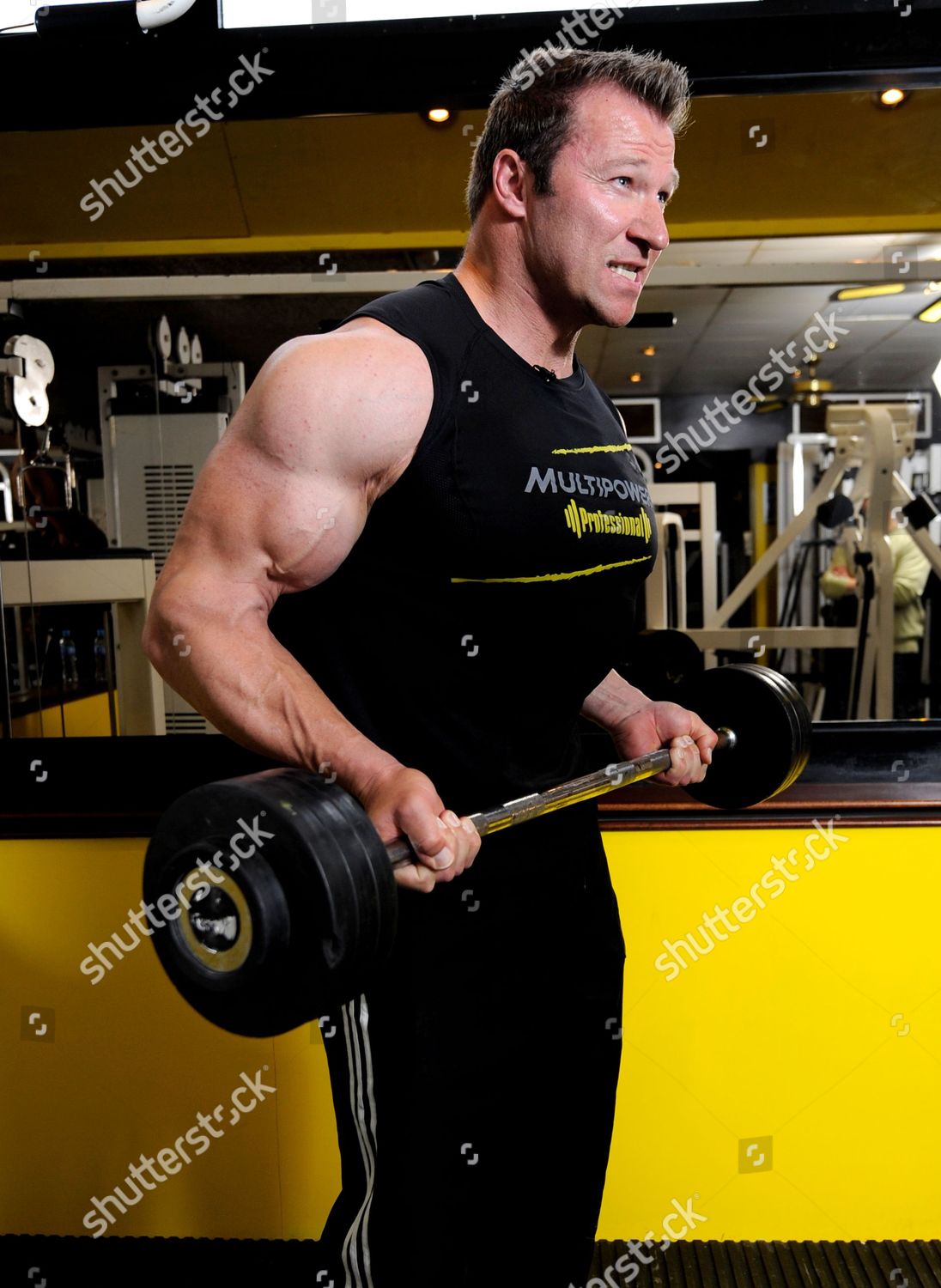 Bodybuilder Gunter Schlierkamp Demonstrates Lifting Technique Editorial ...