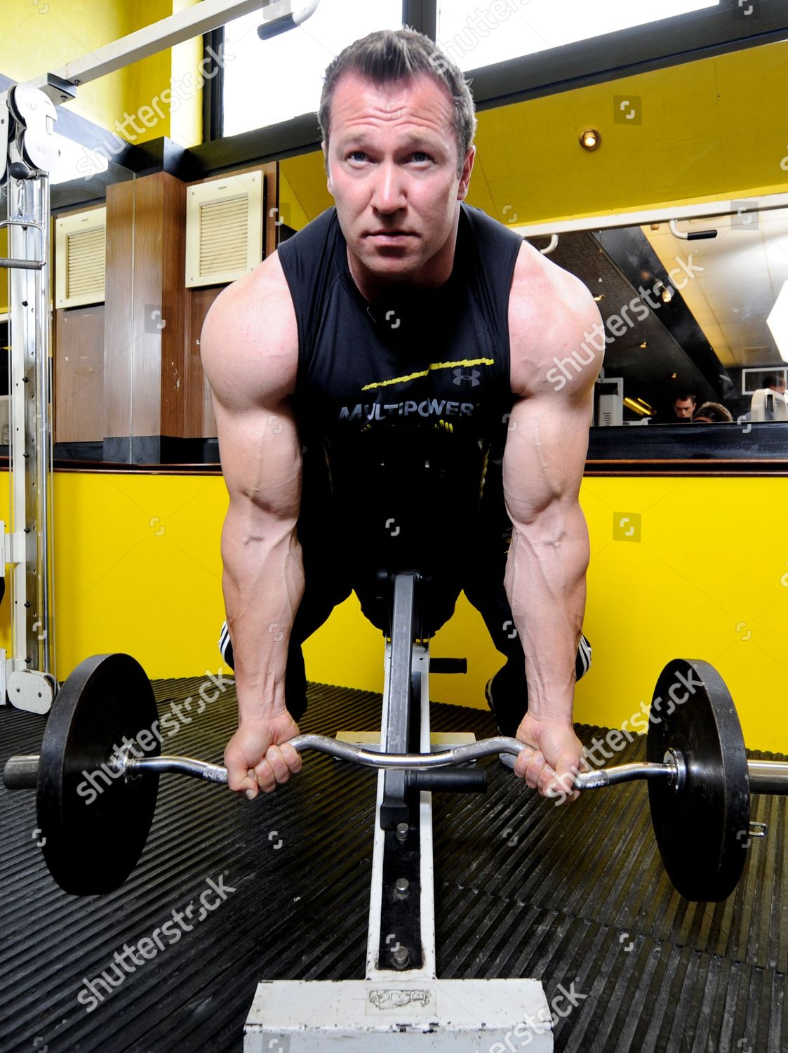 Bodybuilder Gunter Schlierkamp Demonstrates Lifting Technique Editorial ...