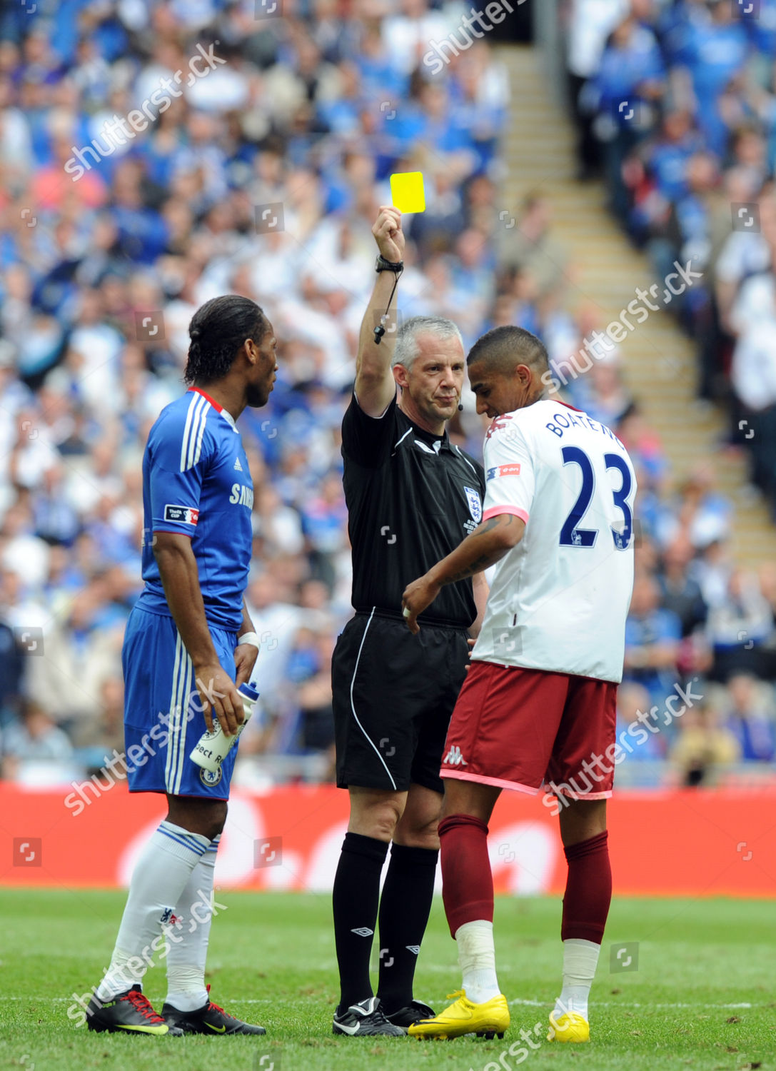 Referee Chris Foy Shows Yellow Card Editorial Stock Photo - Stock Image ...