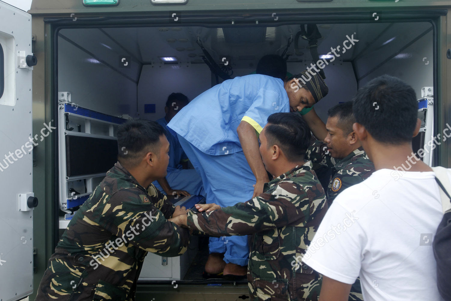Filipino Soldiers Carry Rescued Malaysian Sailor Editorial Stock Photo ...