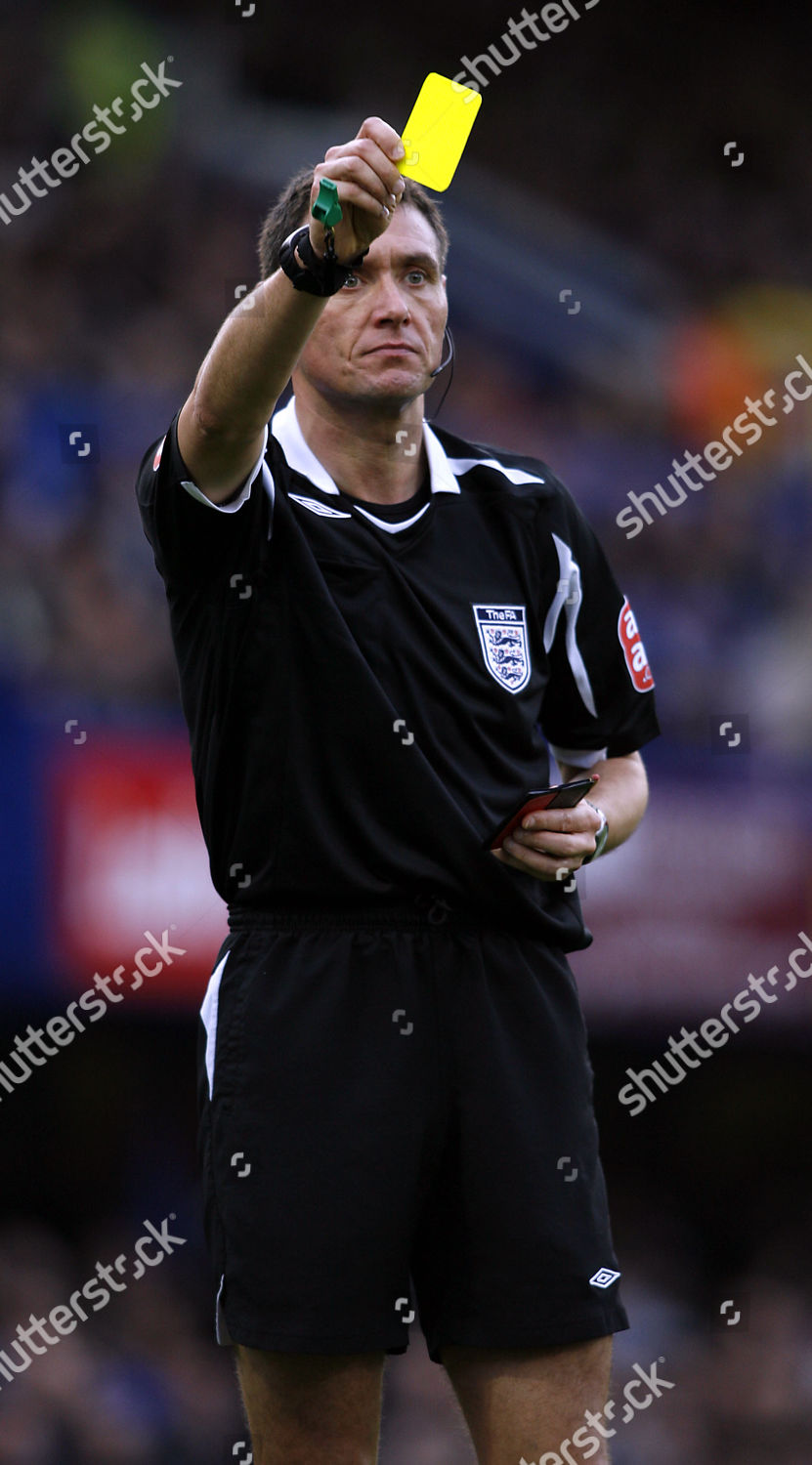 Referee Marriner Gives Out Yellow Card Editorial Stock Photo - Stock ...