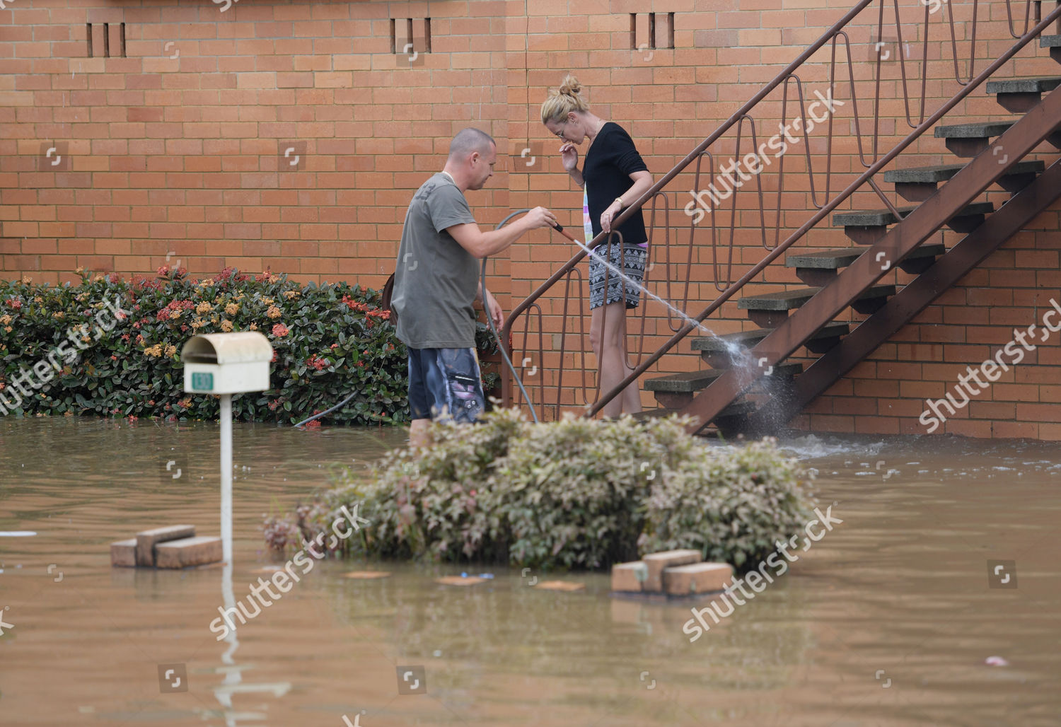 Residents Hose Down Their House Floodwater Editorial Stock Photo ...