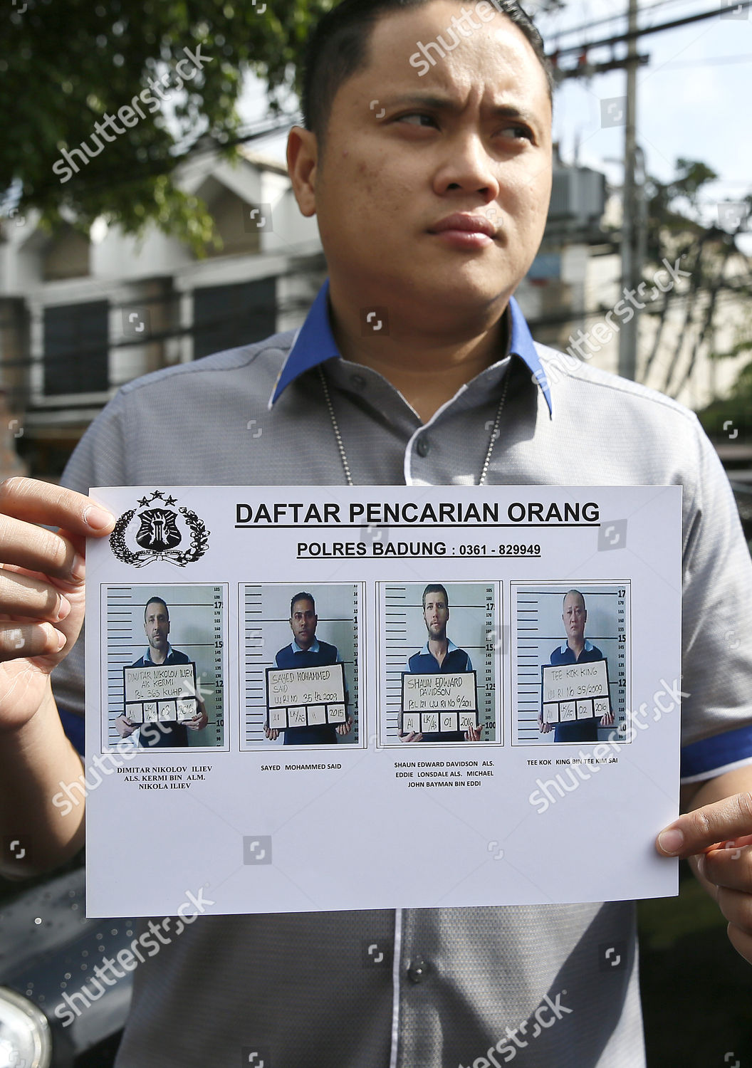 Indonesian Police Officer Shows Photographs Four Editorial Stock Photo ...