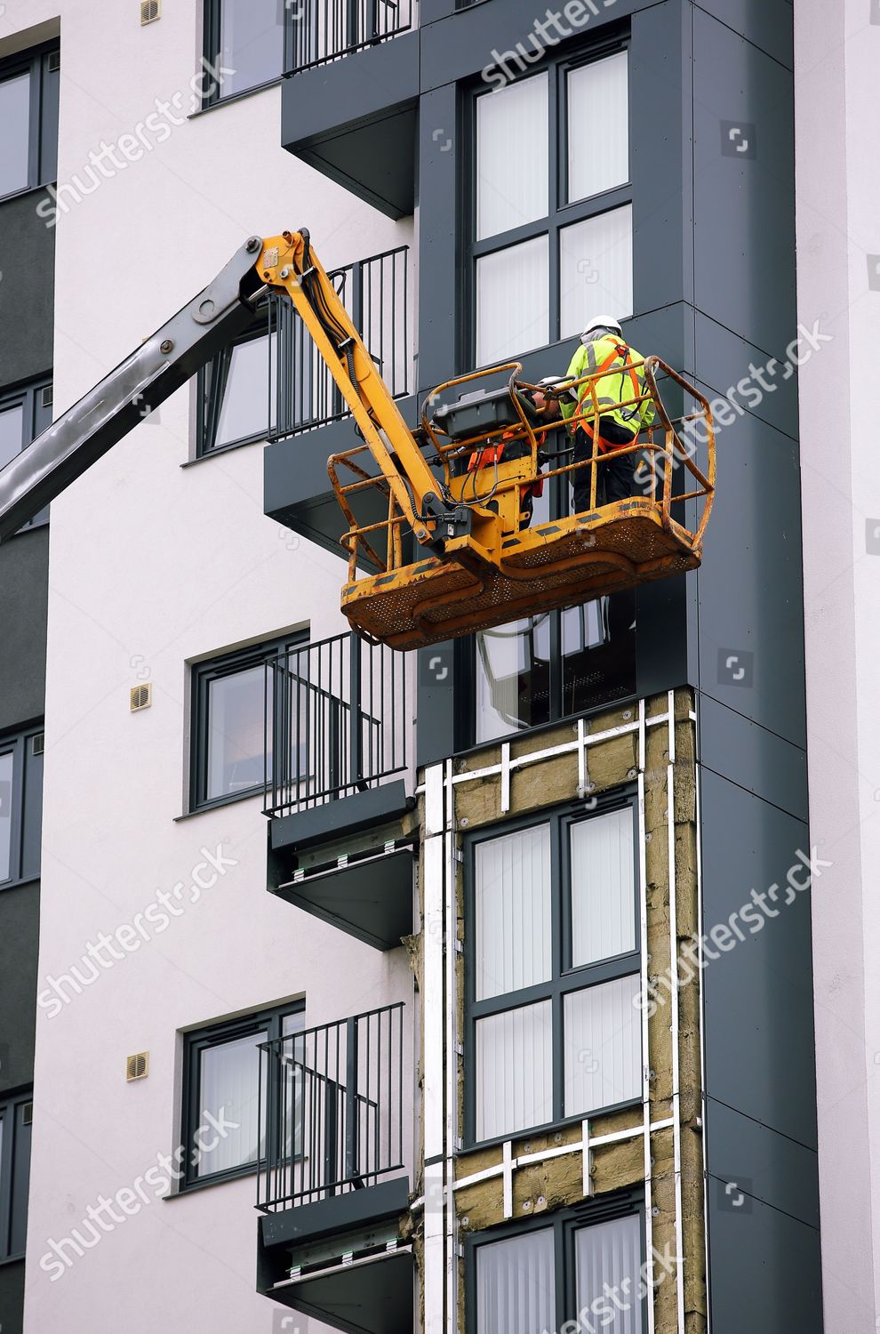 Workers On Cherry Picker Remove Cladding Editorial Stock Photo - Stock ...