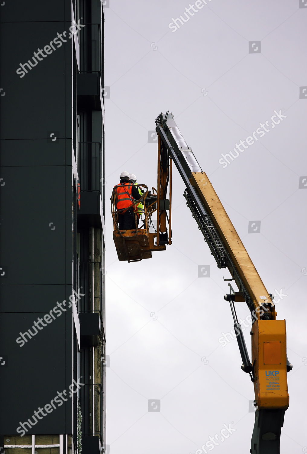 Workers On Cherry Picker Remove Cladding Editorial Stock Photo - Stock ...