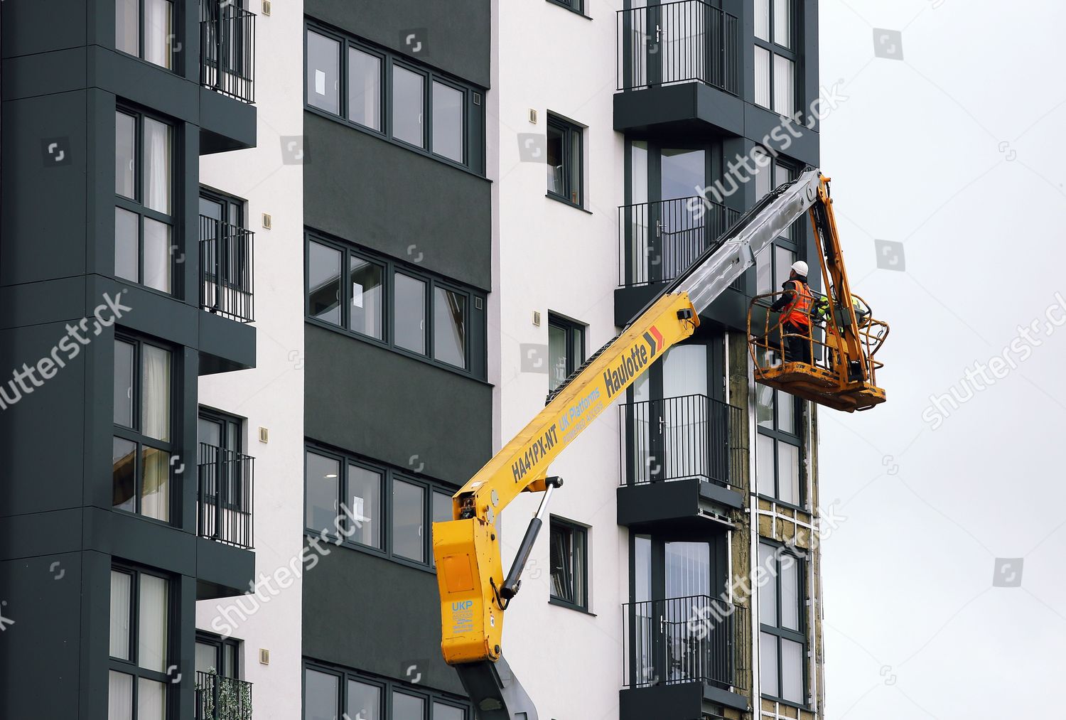 Workers On Cherry Picker Remove Cladding Editorial Stock Photo - Stock ...