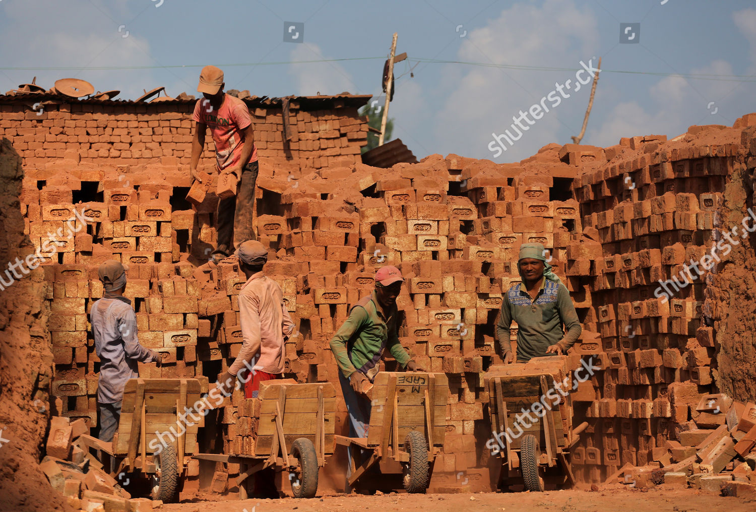 Migrant Labours Load Bricks On Their Editorial Stock Photo - Stock ...