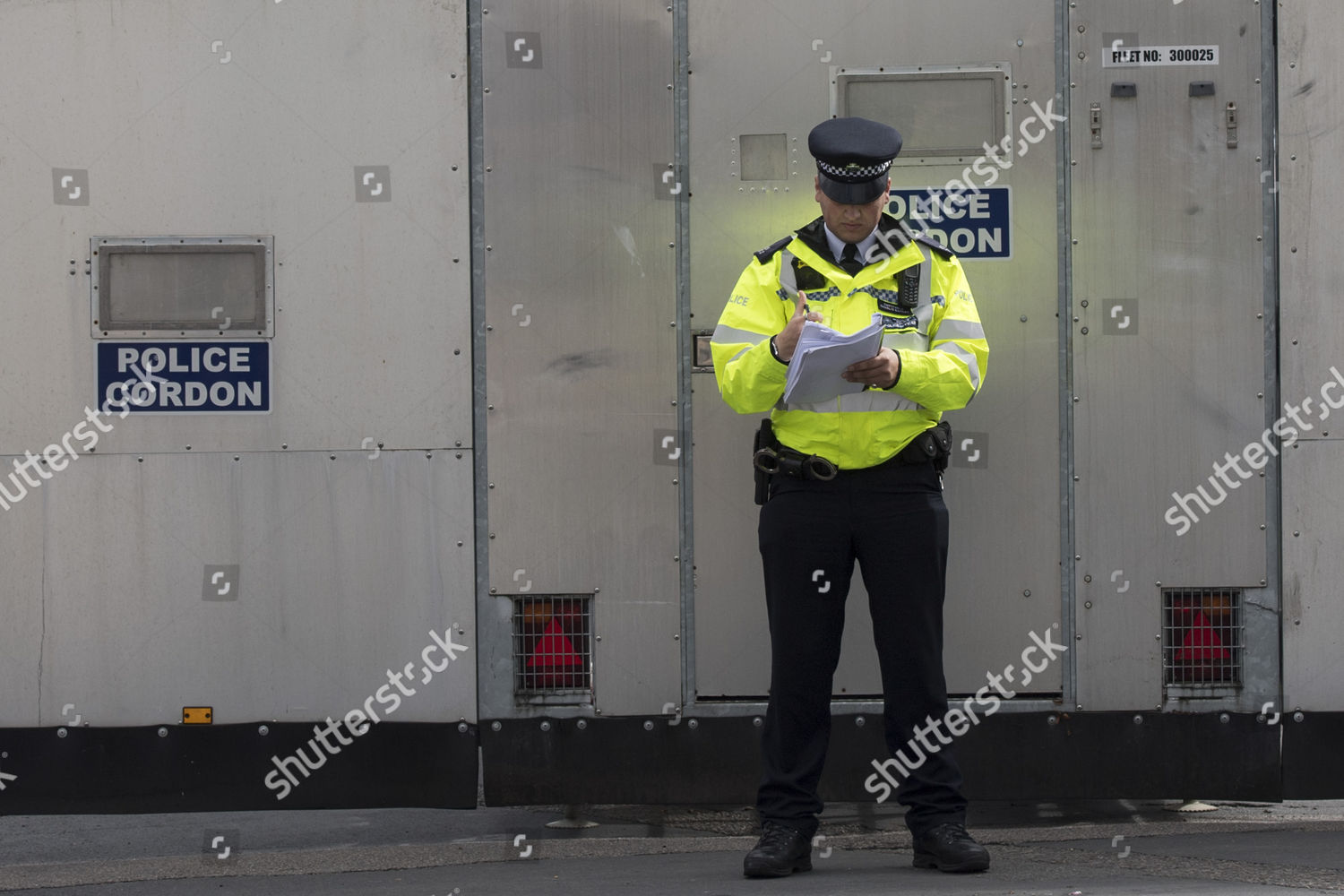 Police Officer Stands By Barrier Cordon Editorial Stock Photo - Stock ...
