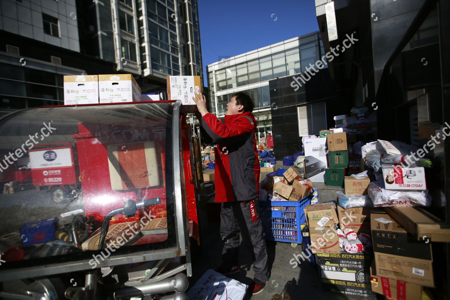Chinese Kuadi Delivery Man Loads Packages Editorial Stock Photo - Stock ...