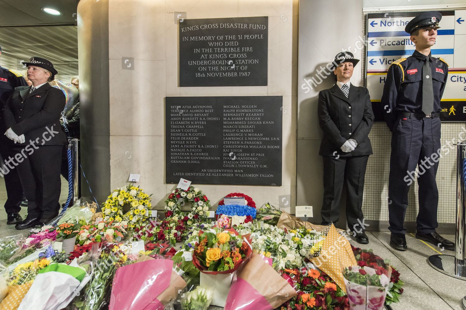 Memorial Flowers Flanked By Police Officers Editorial Stock Photo ...