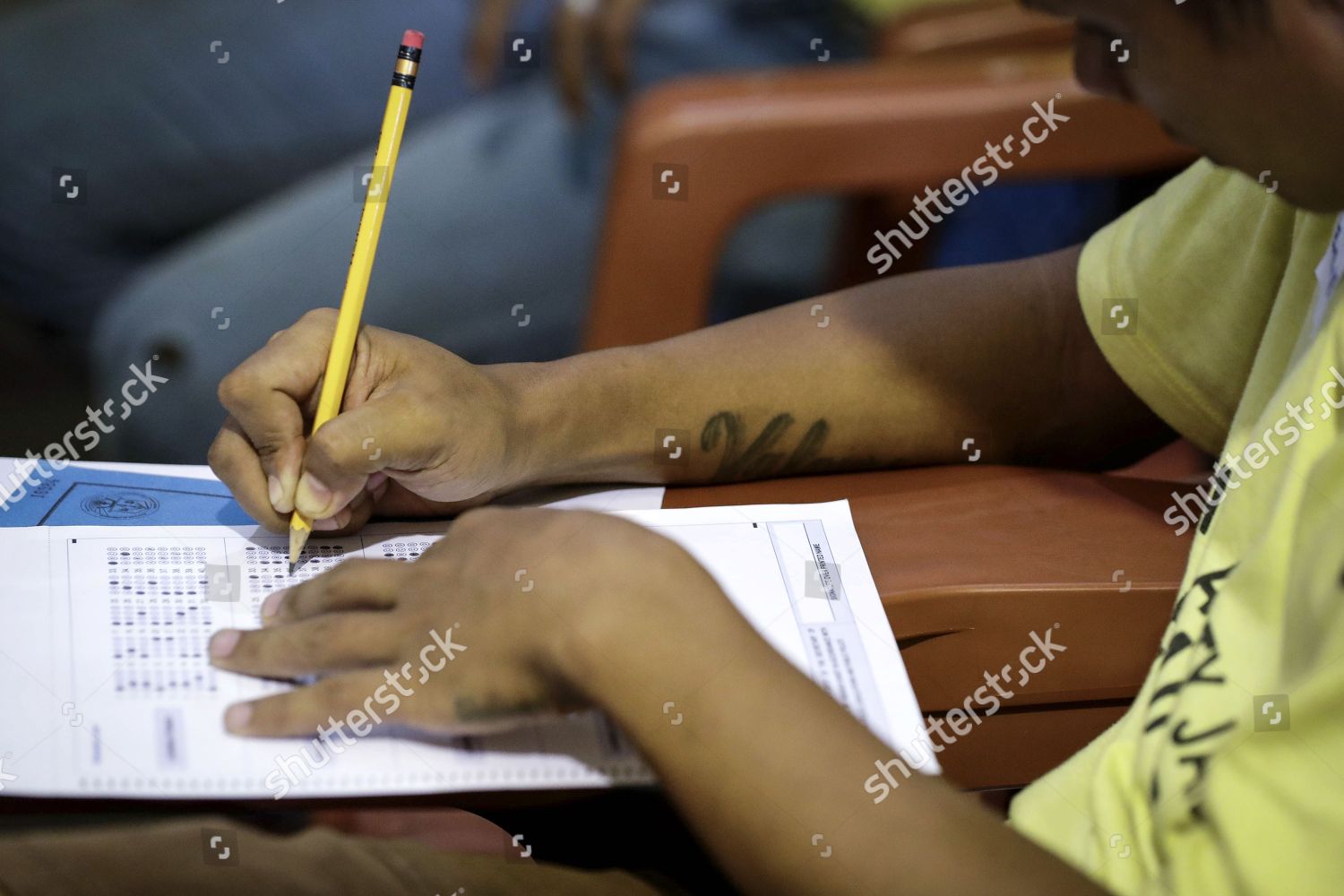Inmate Fills His Answering Sheet During Editorial Stock Photo - Stock ...