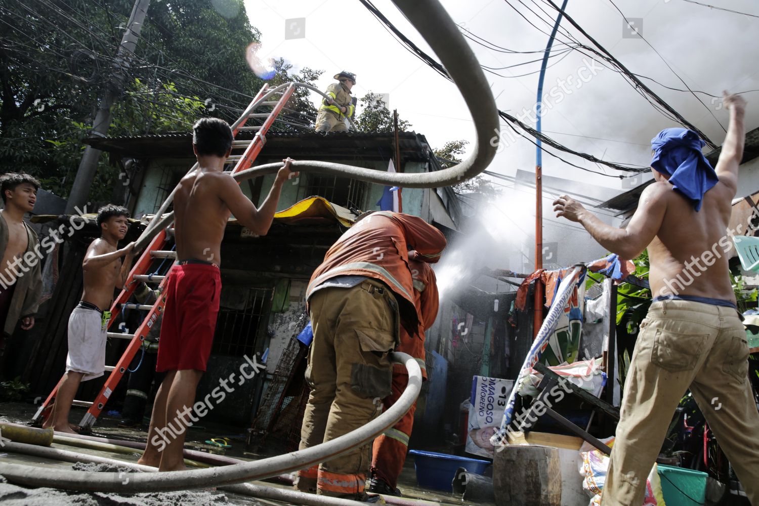 Filipino Residents Help Firemen On Their Editorial Stock Photo - Stock ...