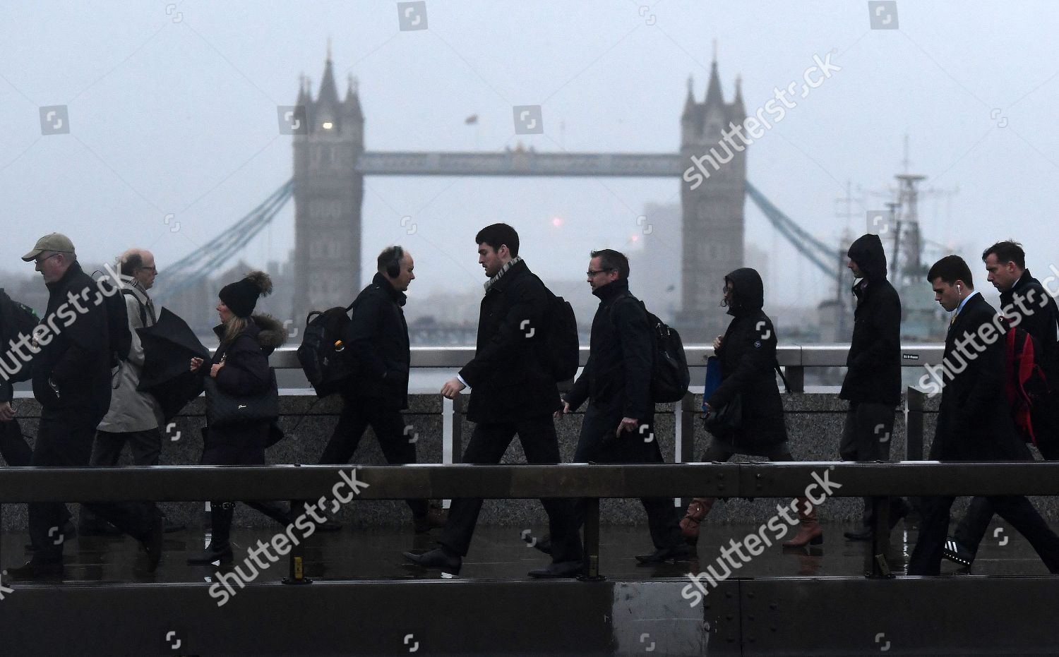 Commuters Walk Over London Bridge On Editorial Stock Photo - Stock ...