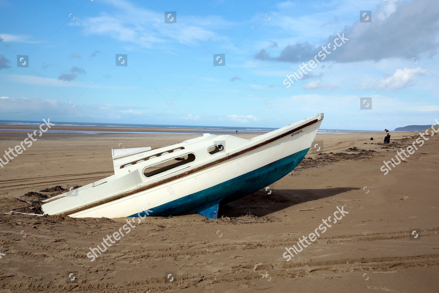 Small Boat Partially Buried On Saunton Editorial Stock Photo - Stock ...