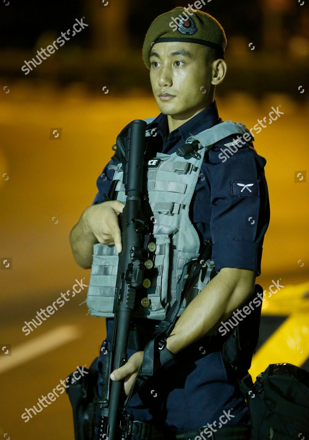 Singaporean Police Officer Stands Guard Near Editorial Stock Photo ...