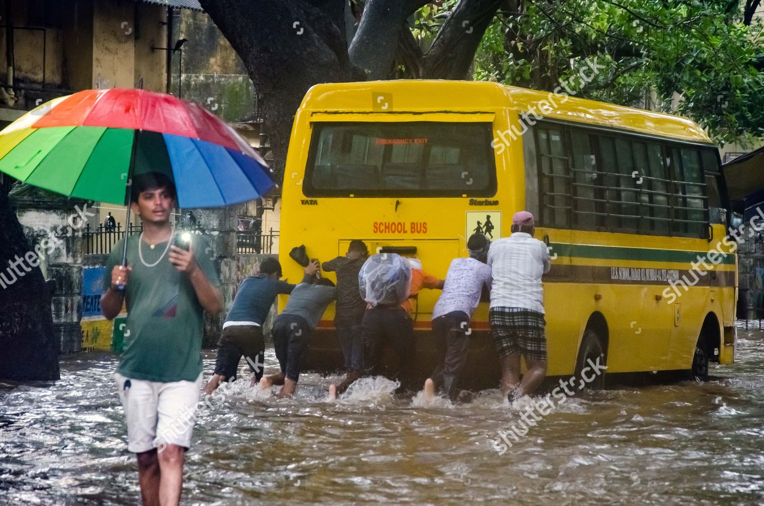 People Push Vehicle Through Rain Water Editorial Stock Photo - Stock ...