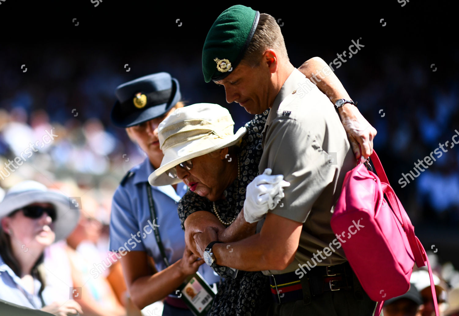 Spectator Helped Off Centre Court By Editorial Stock Photo - Stock ...