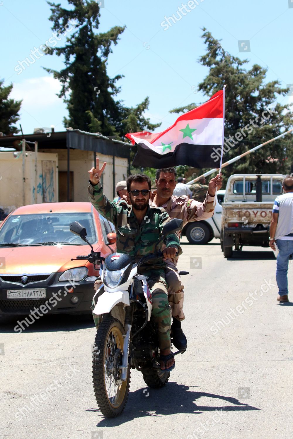 SYRIAN SOLDIERS WAVE VICTORY SIGN FLAG Editorial Stock Photo - Stock ...