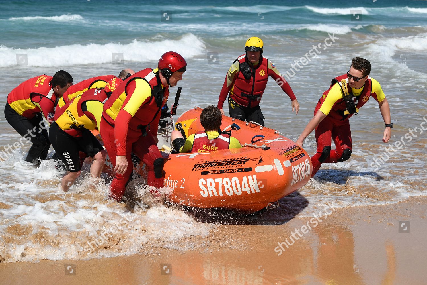 Volunteer Surf Life Savers Perform Rescue Editorial Stock Photo - Stock ...