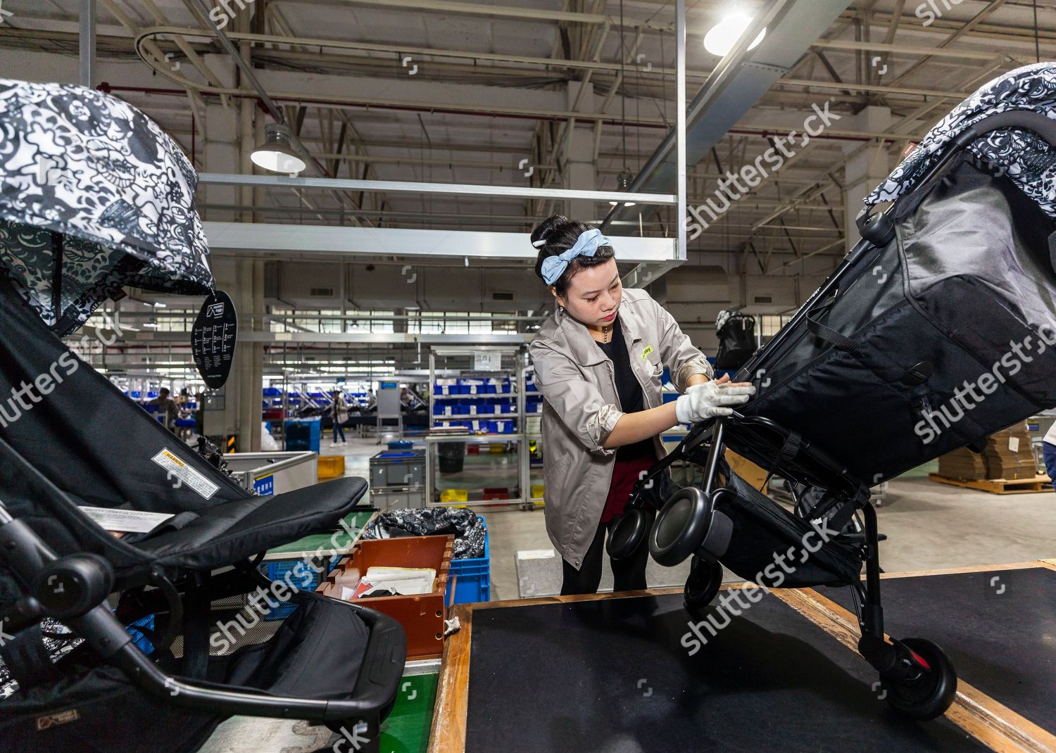 Worker Assembles Stroller Good Baby Factory Editorial Stock Photo ...