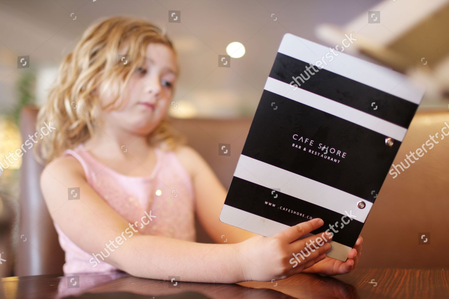Model Released Young Girl Reading Menu Editorial Stock Photo - Stock ...