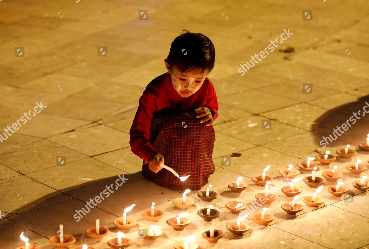 Young Boy Lights Candle He Makes Editorial Stock Photo - Stock Image ...