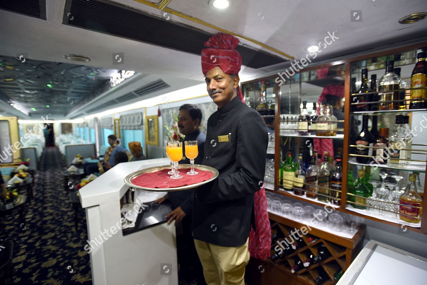 BARTENDER POSES PHOTO INSIDE LUXURY TRAIN Editorial Stock Photo - Stock ...